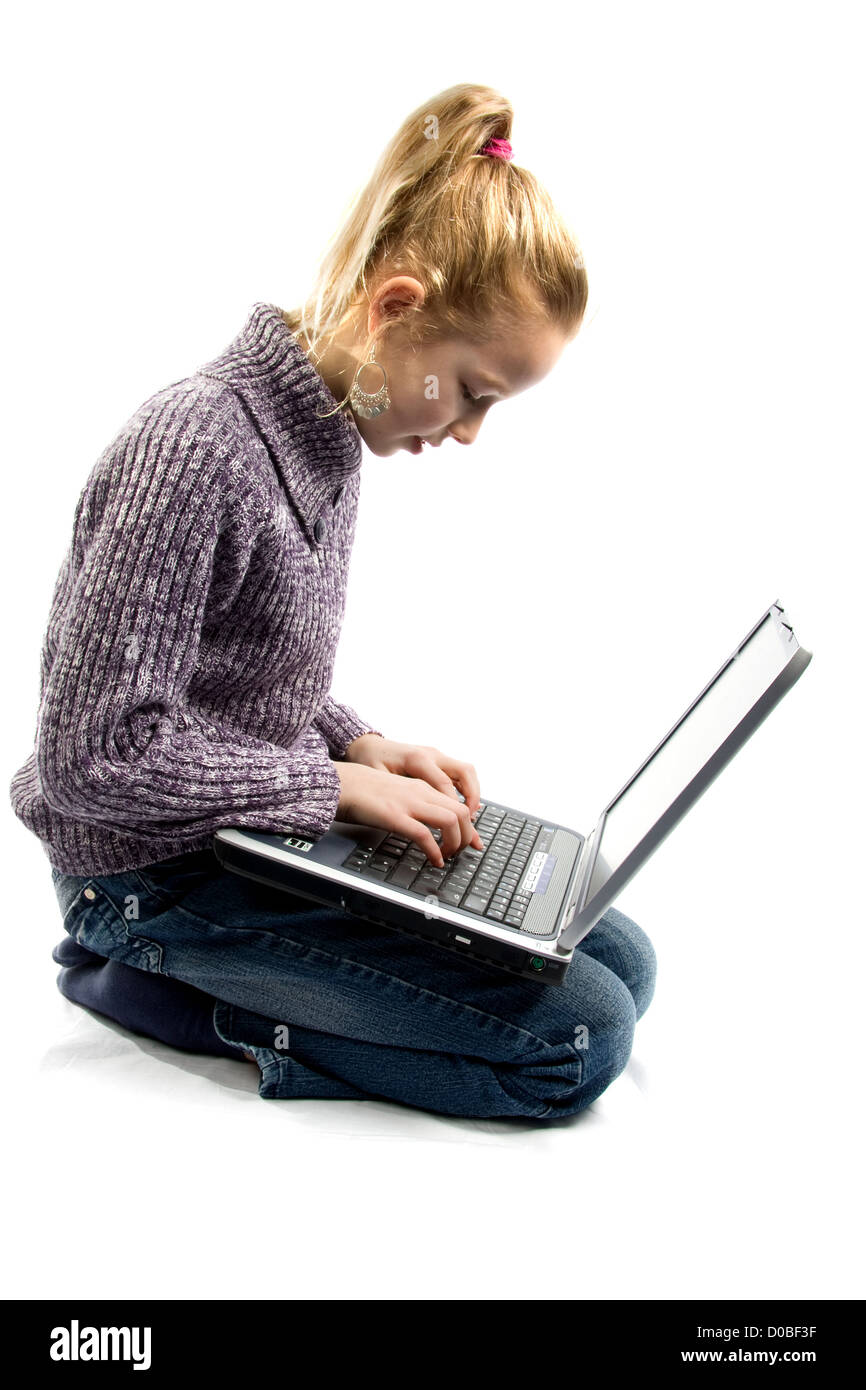 Young Girl with laptop isolated on white background Stock Photo - Alamy