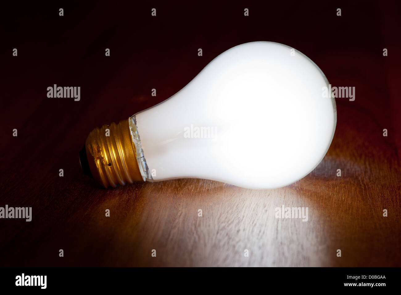 A brightly glowing lightbulb not plugged in Stock Photo - Alamy