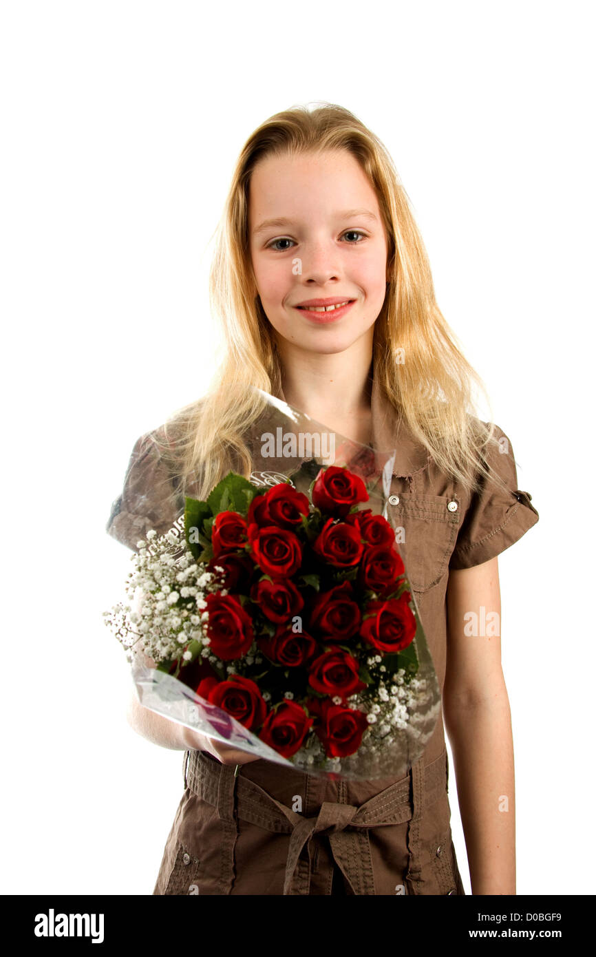 Yound girl gives you a bouquet of red roses, isolated on white ...
