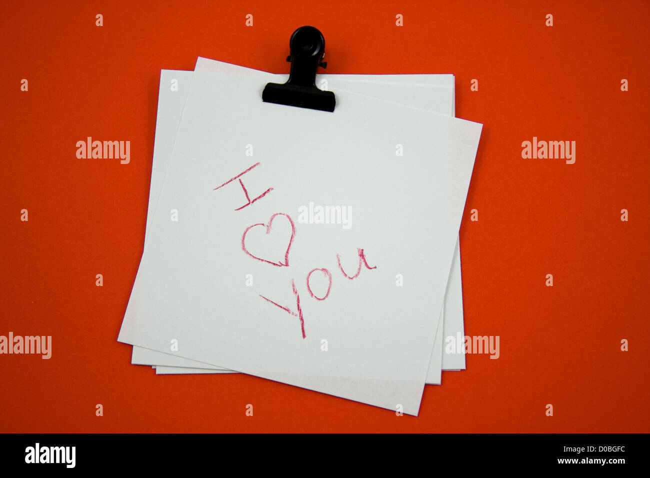 Notice paper with message, white on red Stock Photo - Alamy