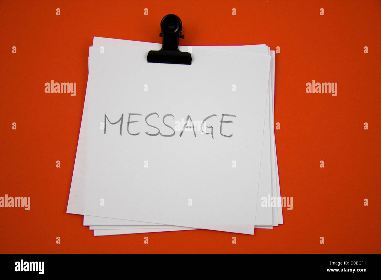 Notice paper with message, white on red Stock Photo - Alamy