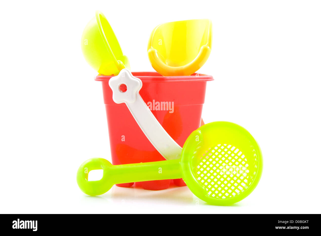 Red bucket and toys, isolated on white background Stock Photo - Alamy