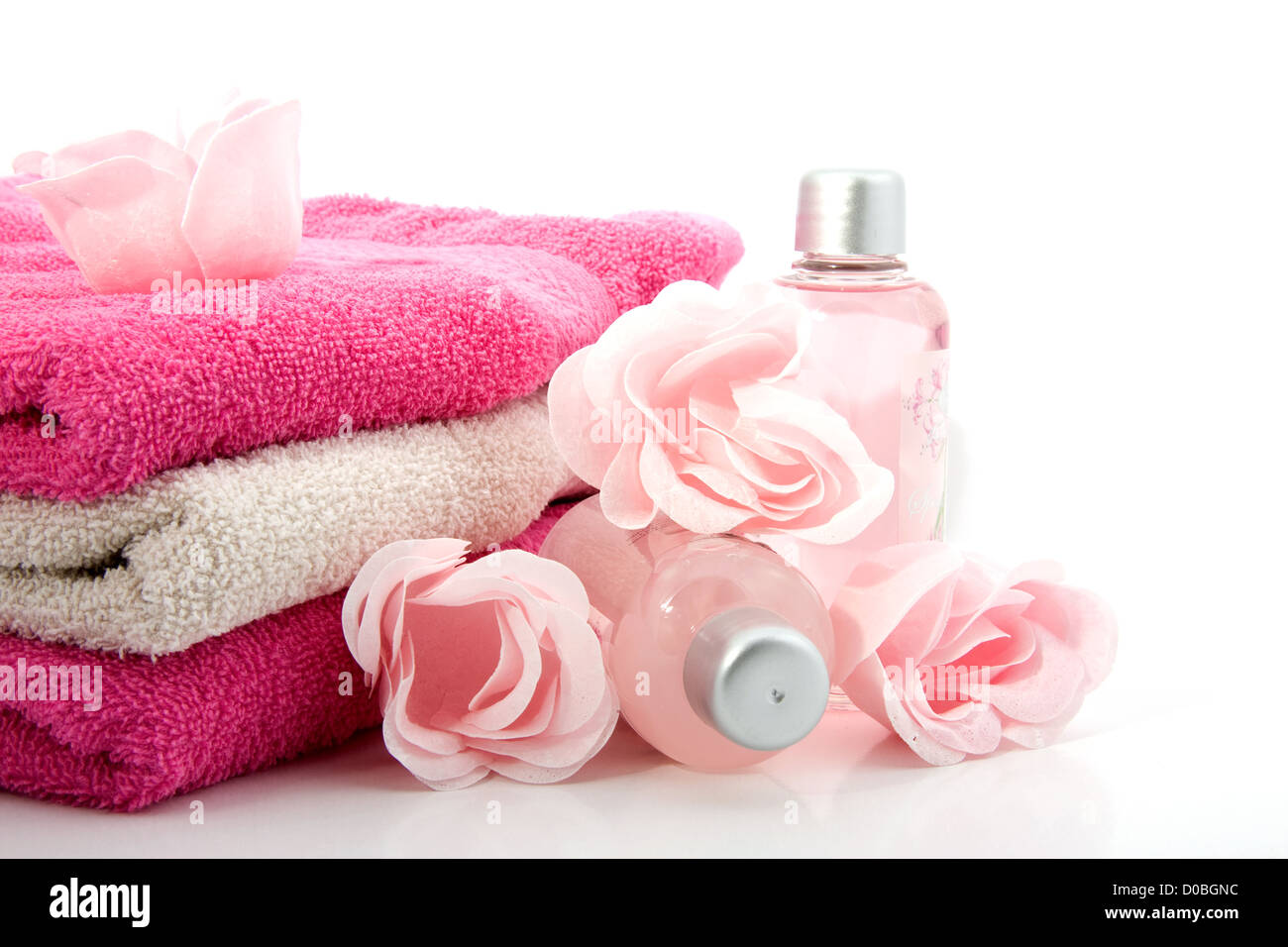 Pink colored spa accesory isolated on white background Stock Photo - Alamy