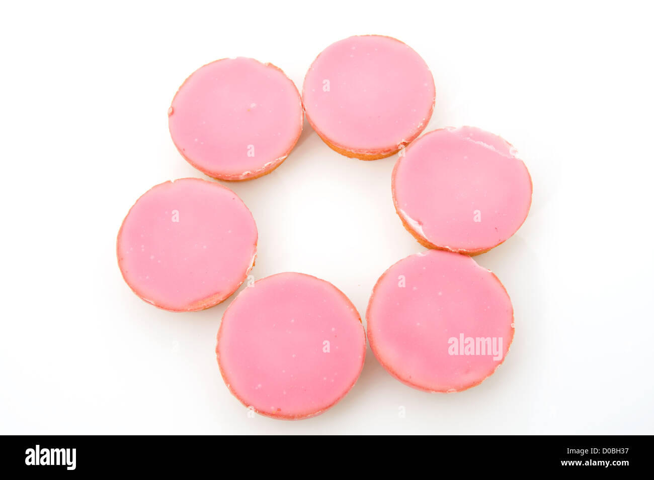 Pink glazed in circle, isolated on white background Stock Photo - Alamy