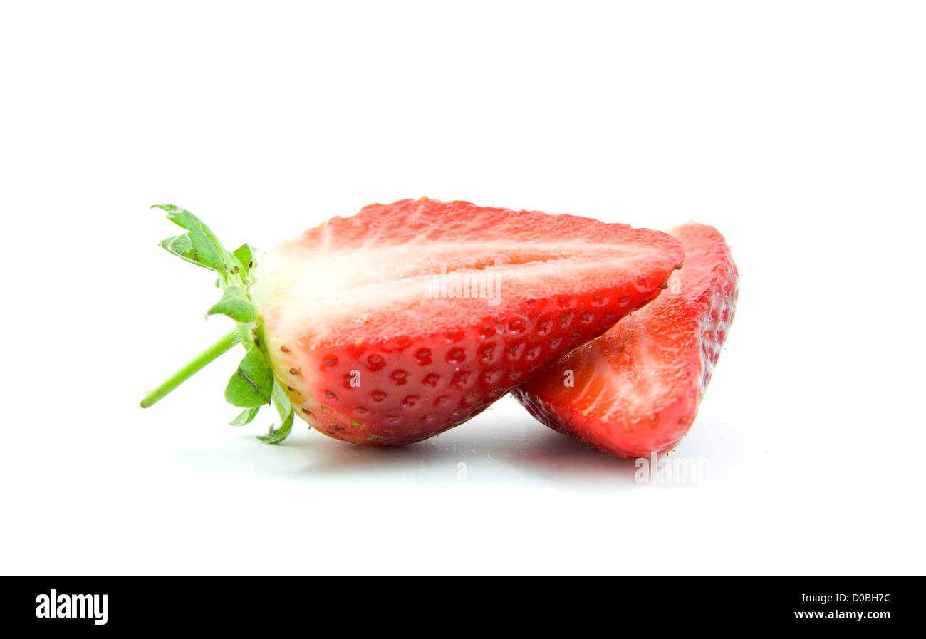 Two half strawberry isolated on white background Stock Photo - Alamy