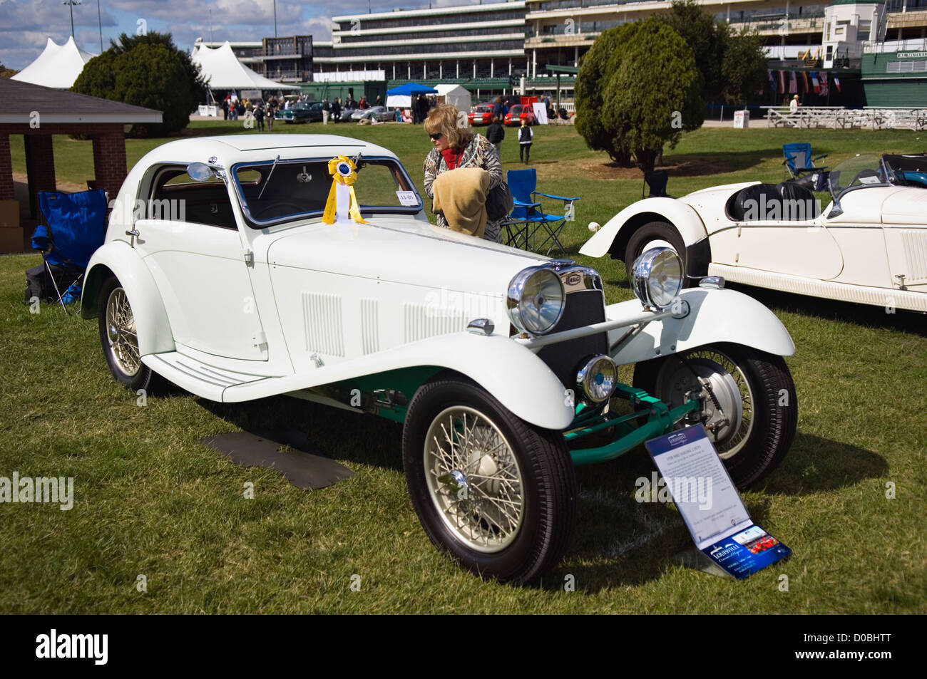 Woman Looking at a 1938 HRG Airline Coupe at the 2012 Concours d ...