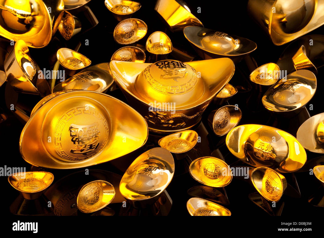 Precious Chinese traditional currency gold yuanbao ingots Stock Photo ...