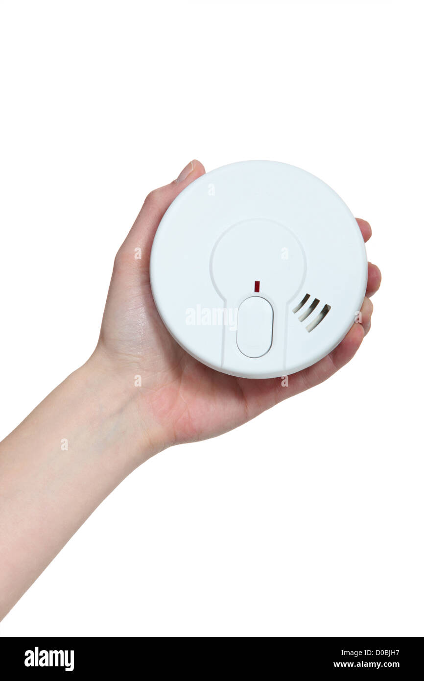 Hand holding a smoke alarm Stock Photo - Alamy
