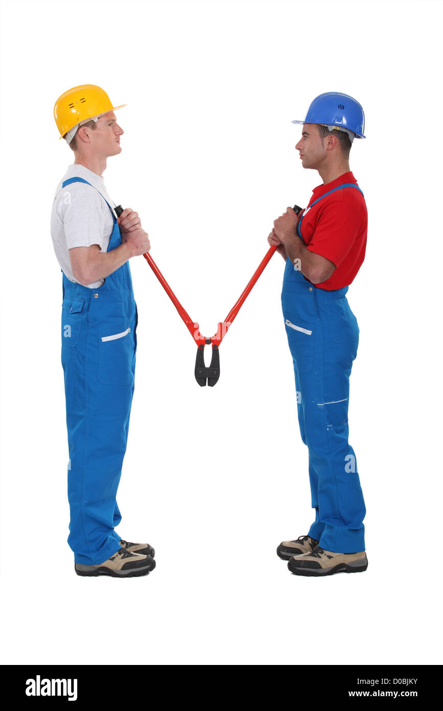 Workers making an M Stock Photo - Alamy