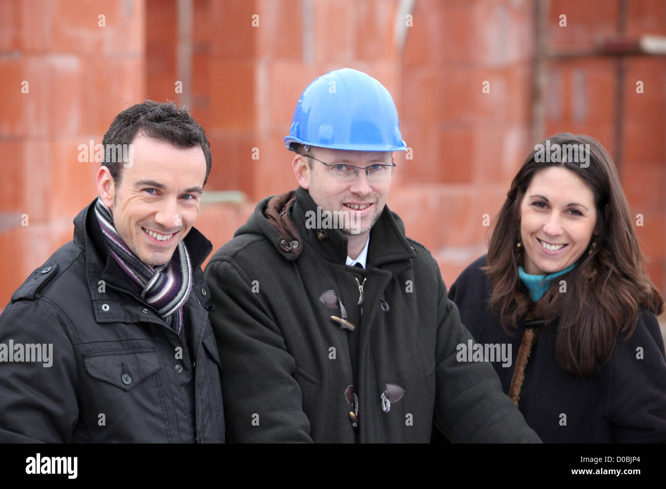 Architect meeting with new property owners Stock Photo - Alamy
