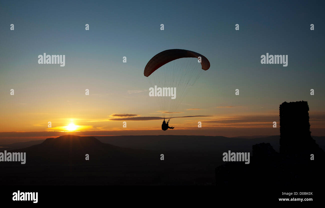 Paraglider in sunset Stock Photo - Alamy