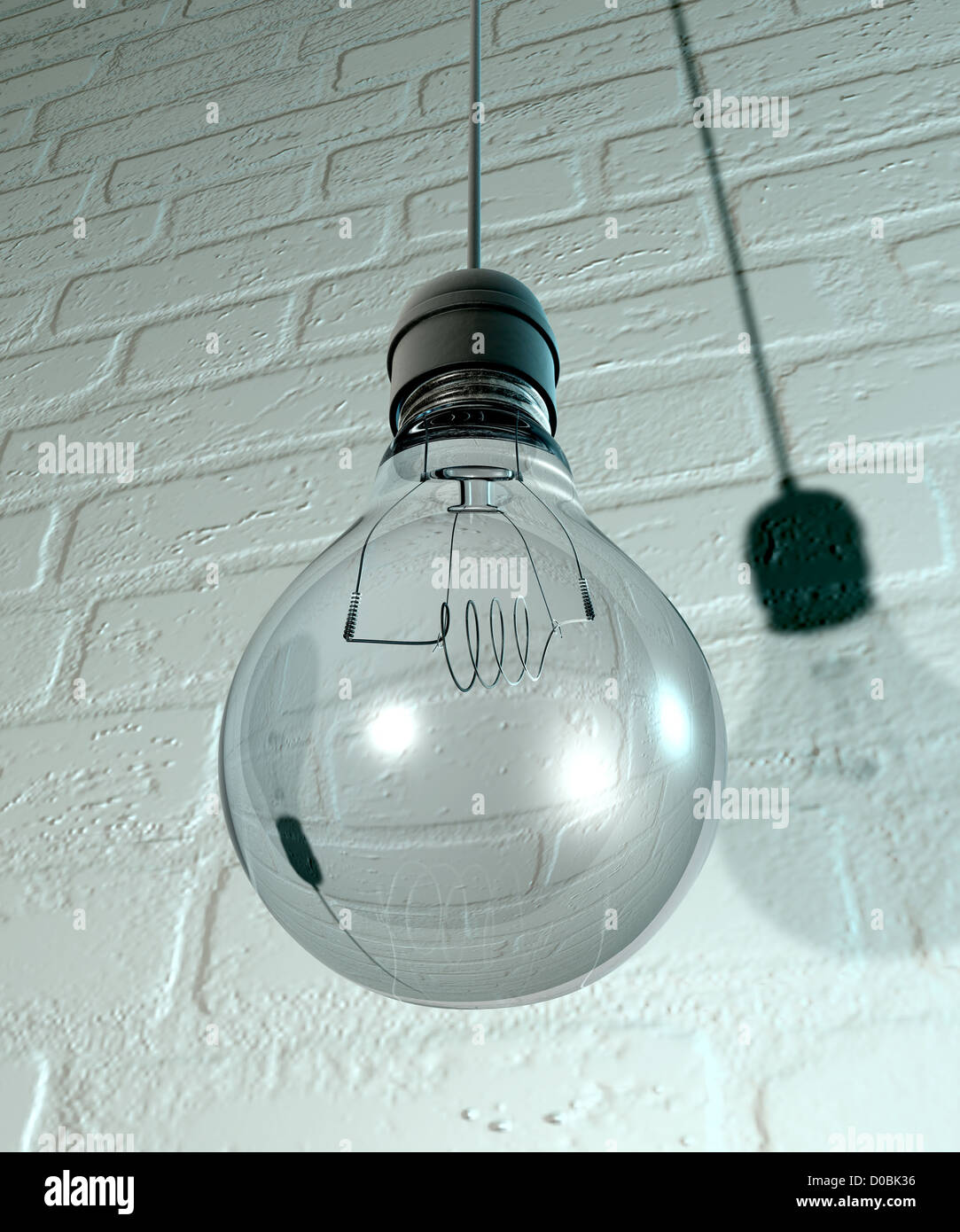 A regular unlit light bulb fitted into a light fitting hanging from a ...