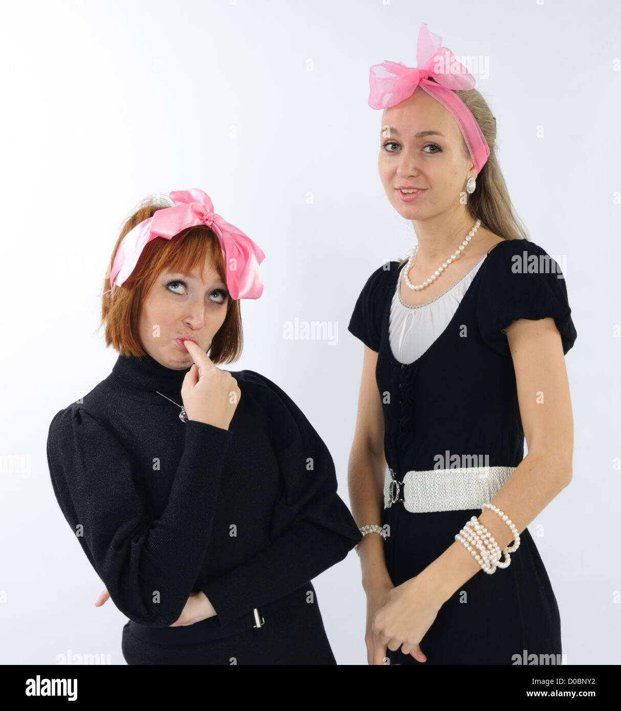 Beautiful young women friends together at the studio Stock Photo - Alamy