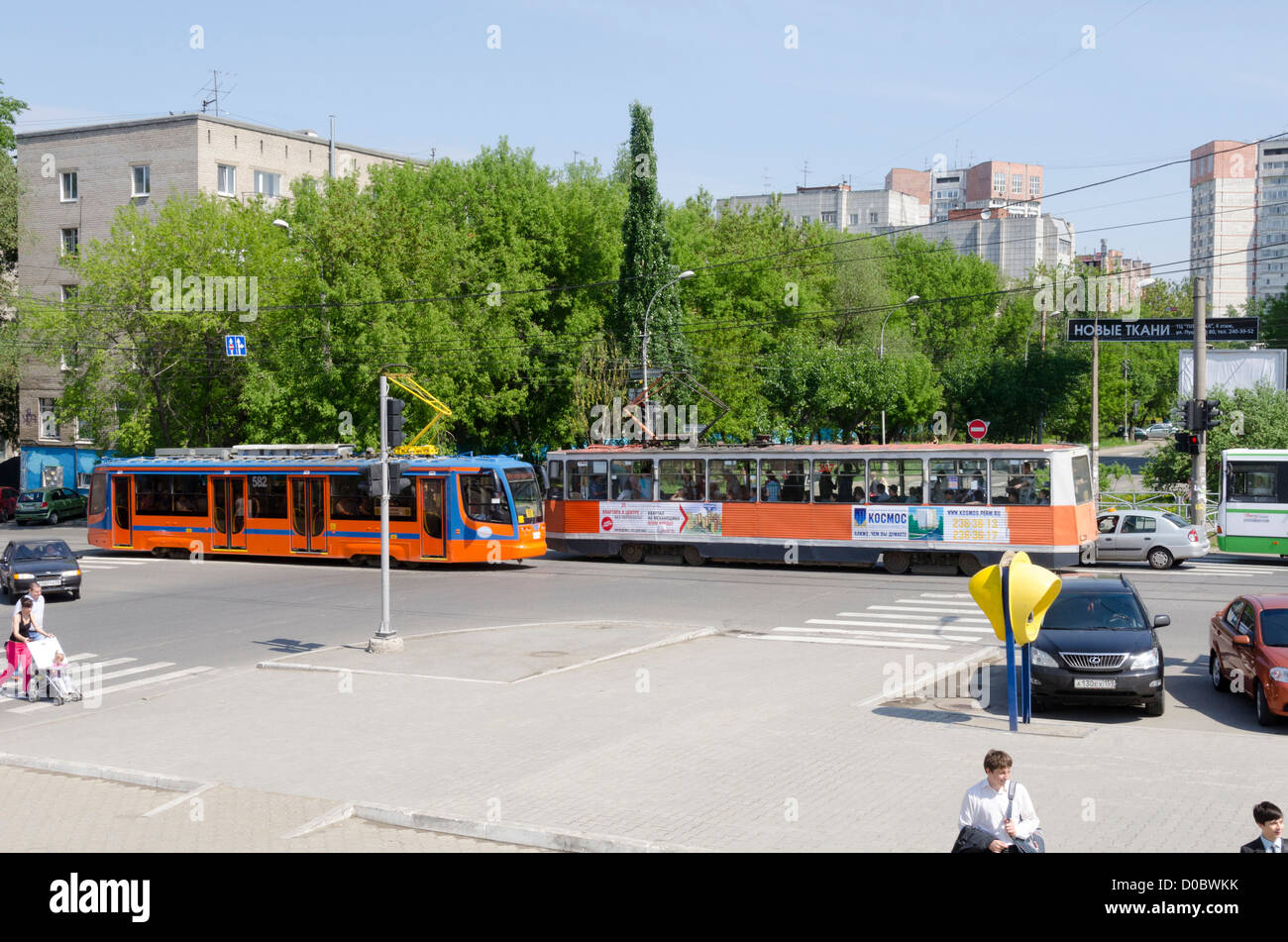 Trams crossing an intersection, Perm, Russia Stock Photo - Alamy
