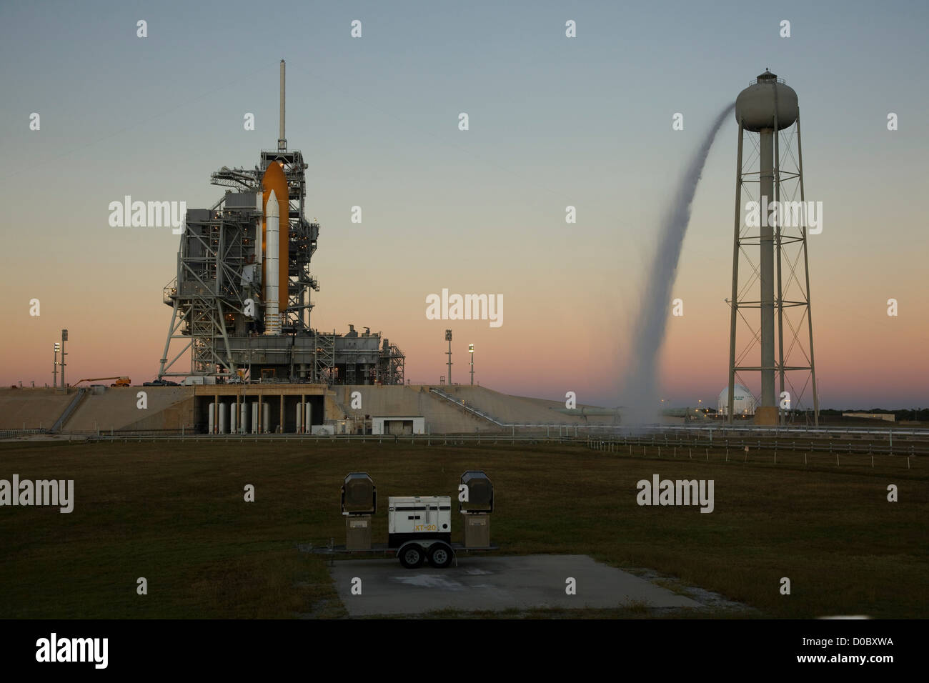 A water tower vents it contents beside Launch Pad 39A Space Shuttle ...