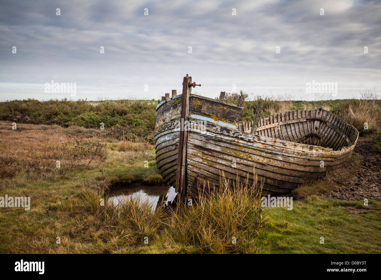 The wreck of a boat on the marshland outside Blakeney, Norfolk Stock ...