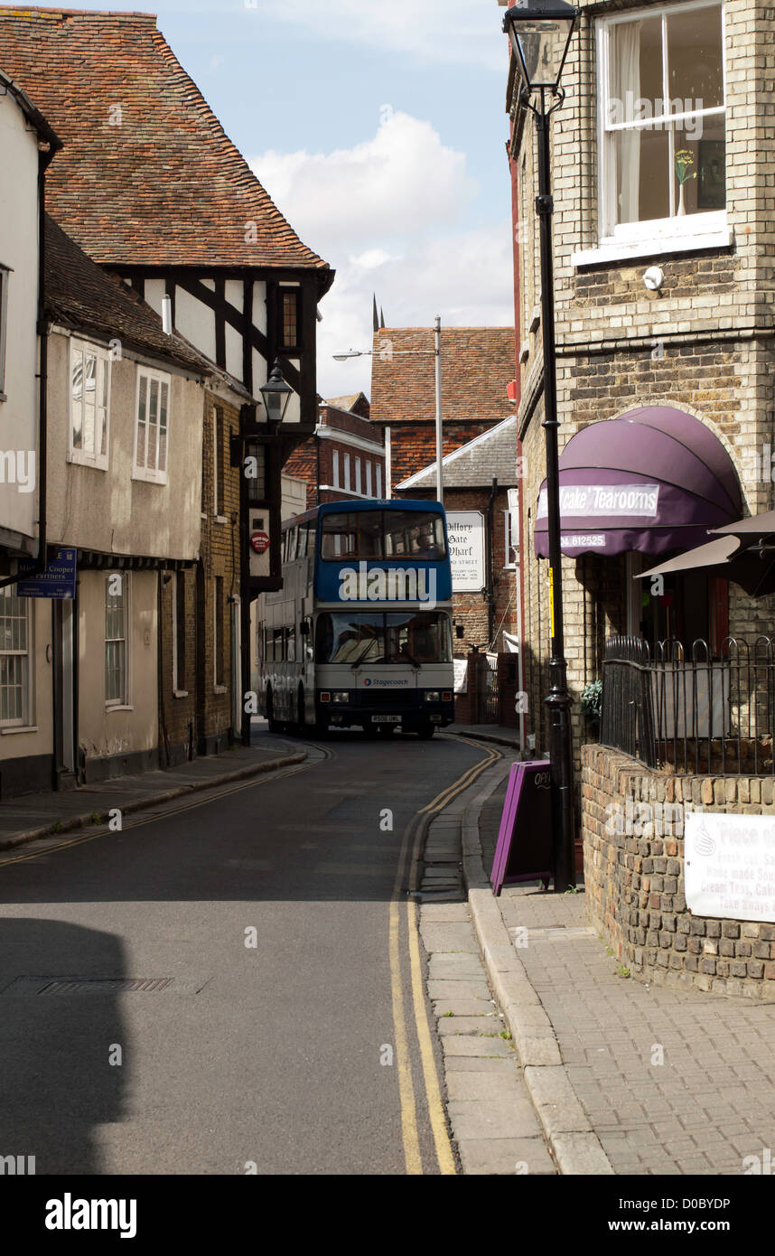 A double-decker bus negotiating the narrow, medieval Strand Street ...