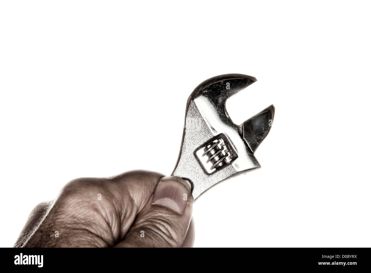 hand holding an adjustable spanner Stock Photo - Alamy