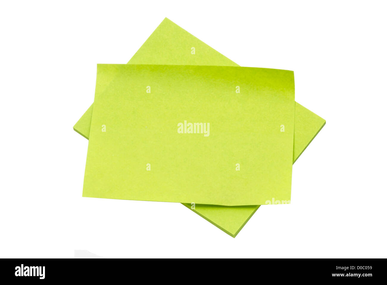 Green memo paper isolated on white background Stock Photo - Alamy