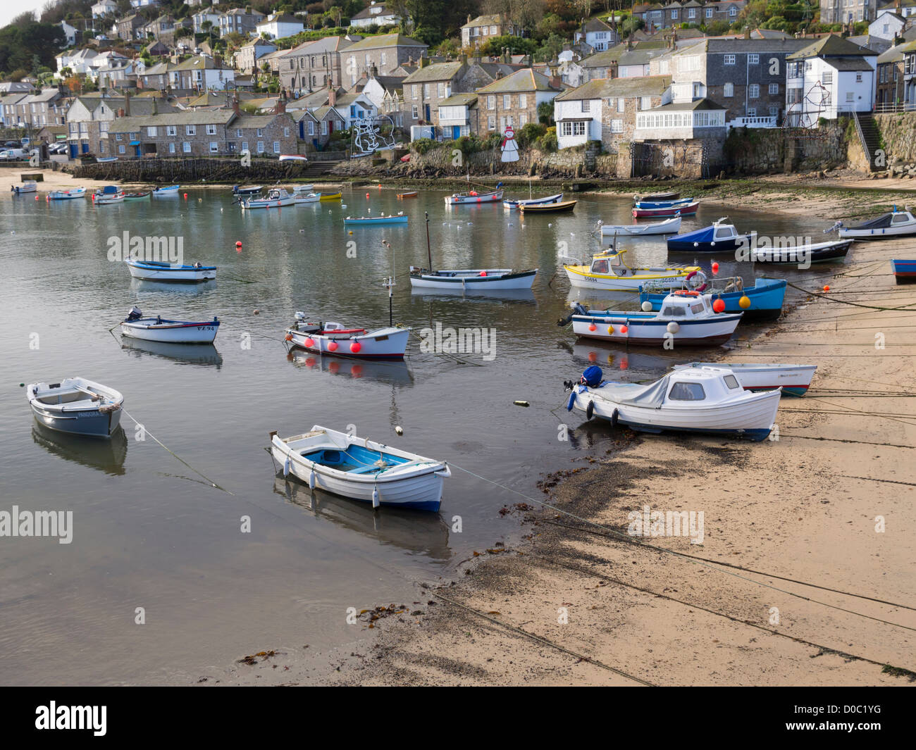 Mousehole, Cornwall. Iconic fishing village with a picturesque harbour ...