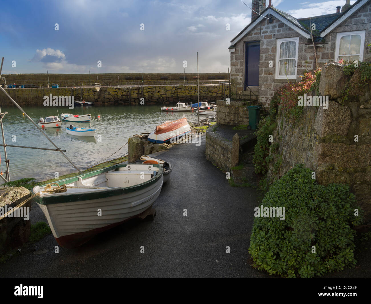 Mousehole, Cornwall. Iconic fishing village with a picturesque harbour ...
