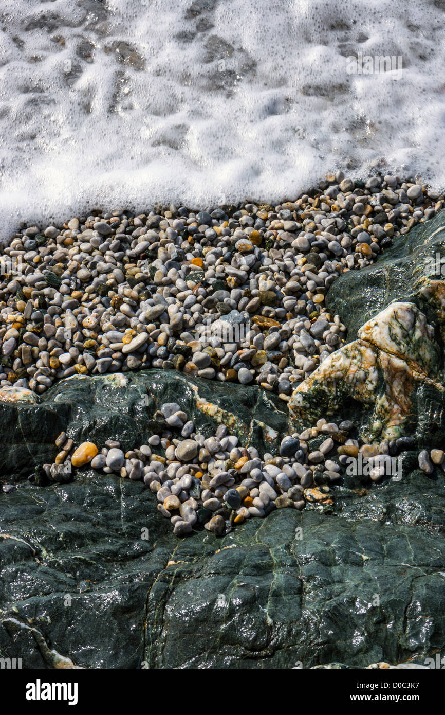 Rock, pebbles and breaking waves, Aegean Sea, Kalymnos, Greece Stock ...