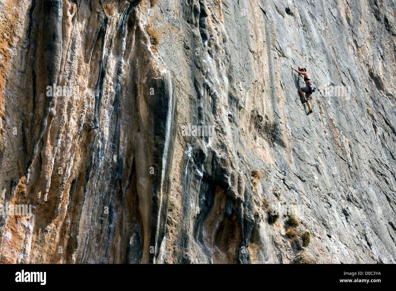 Female rock climber on sheer face, Kalymnos Stock Photo - Alamy