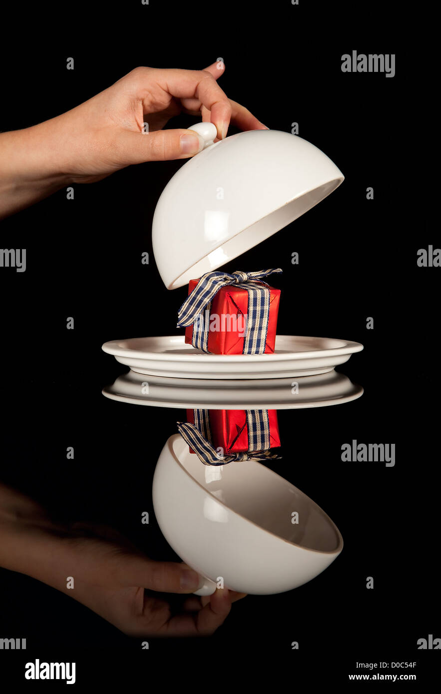 Hands lifting gift box hi-res stock photography and images - Alamy