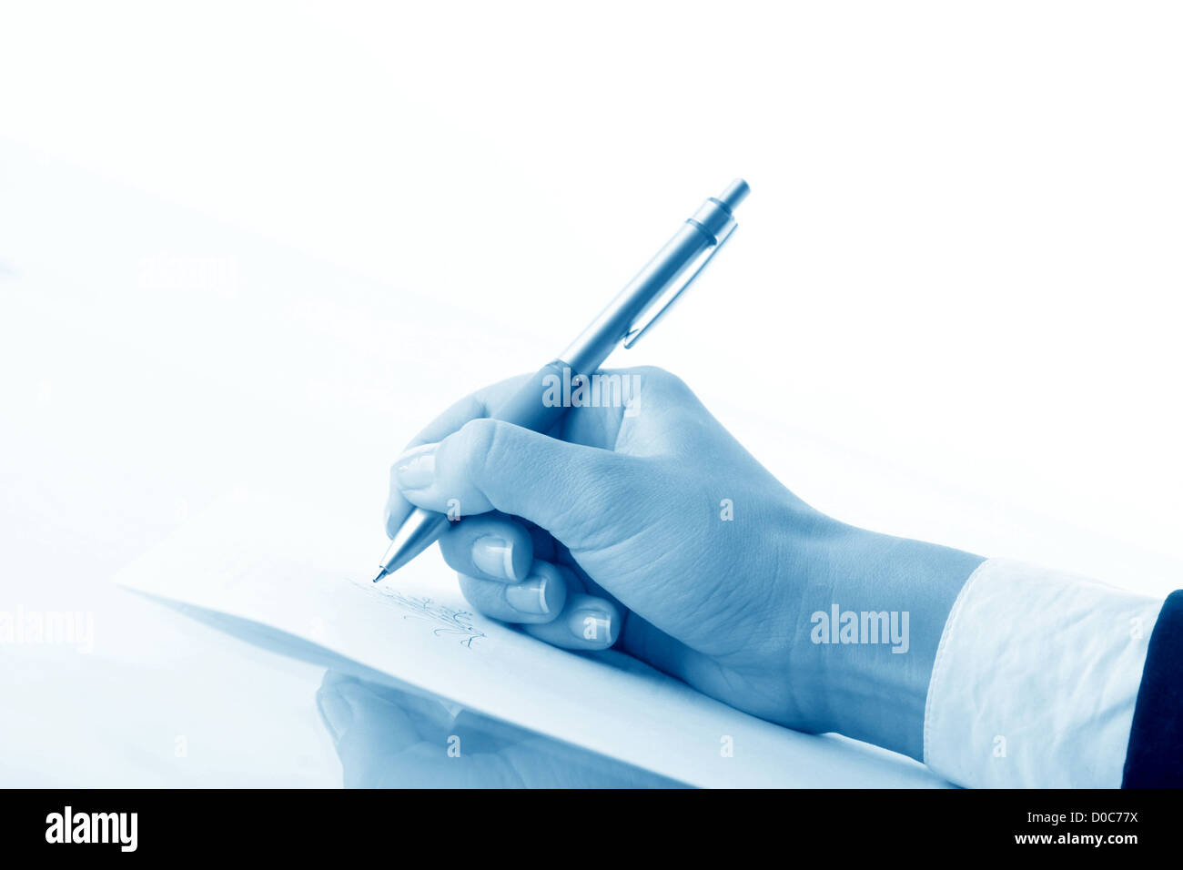 girl write on white paper close up Stock Photo - Alamy