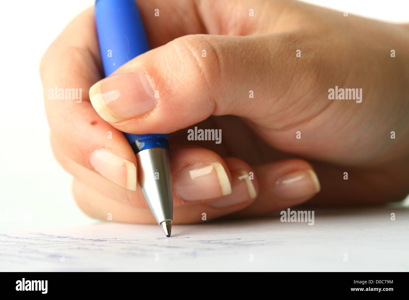 girl write on white paper close up Stock Photo - Alamy