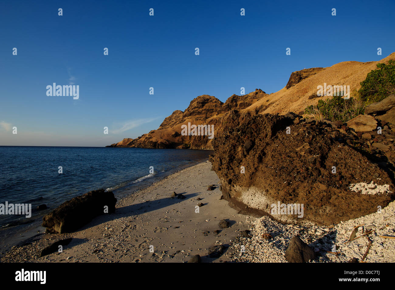 the beach the mountain and a blue sky in Gili Banta one of the island ...