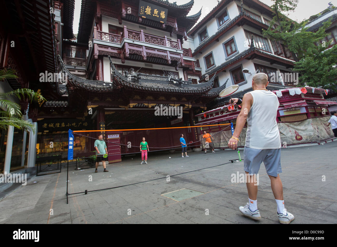 Chinese people play badminton in the Yu Gardens bazaar Shanghai, China ...