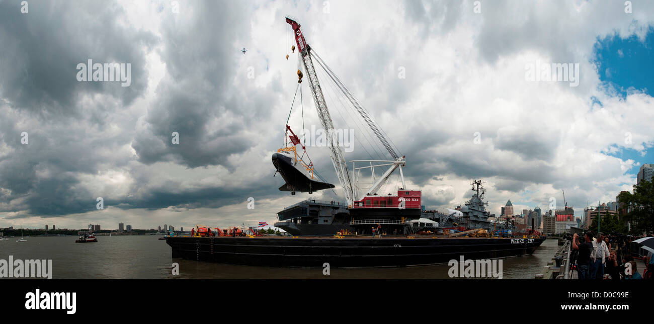 Space Shuttle prototype Enterprise is lifted onto deck USS Intrepid Sea ...