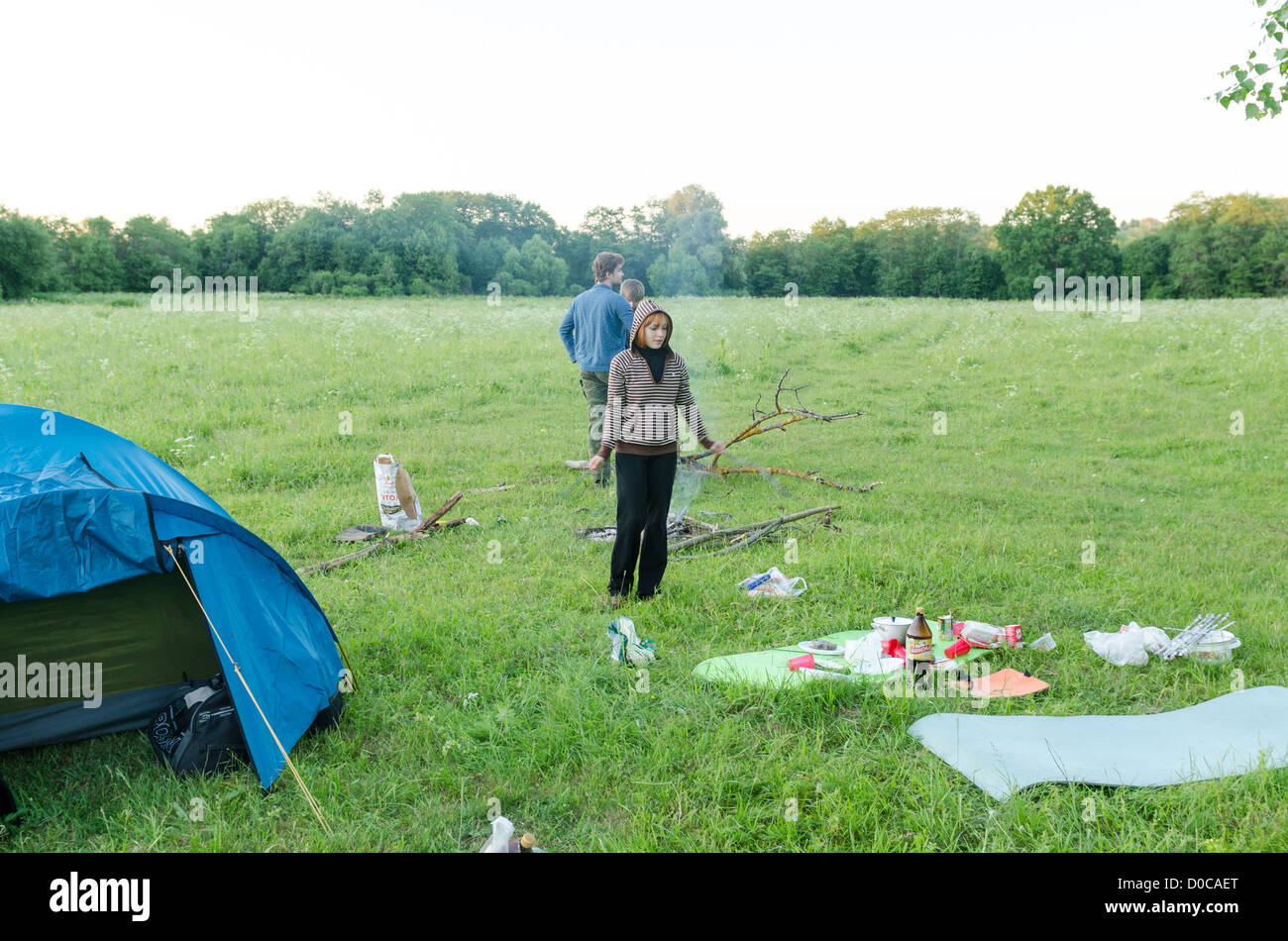 green people hike grass countryside trekking camp Stock Photo - Alamy
