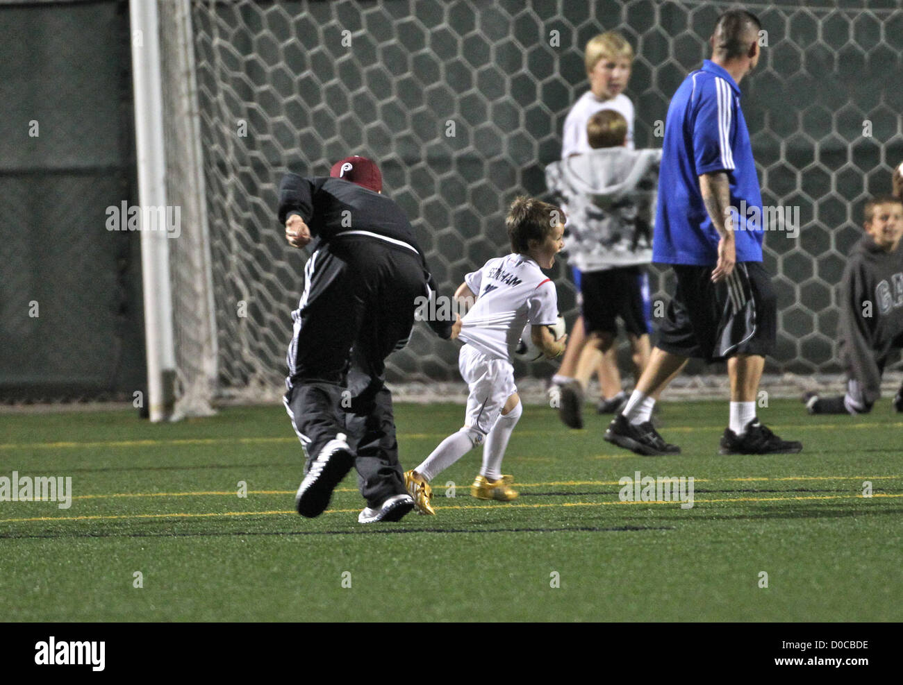 David Beckham with his son Cruz David Beckham plays ball with his two ...