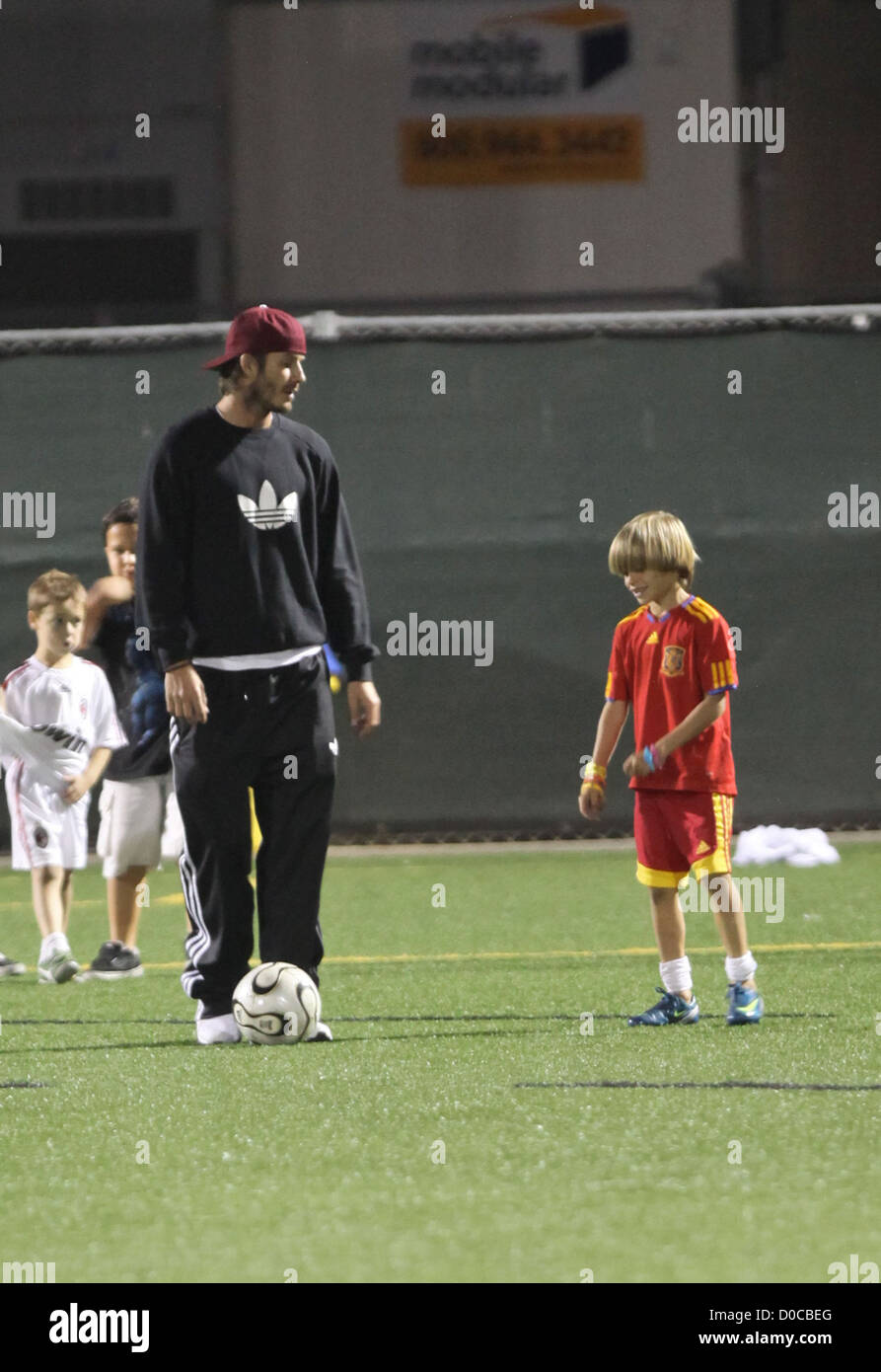 David Beckham with his son Romeo David Beckham plays ball with his two ...