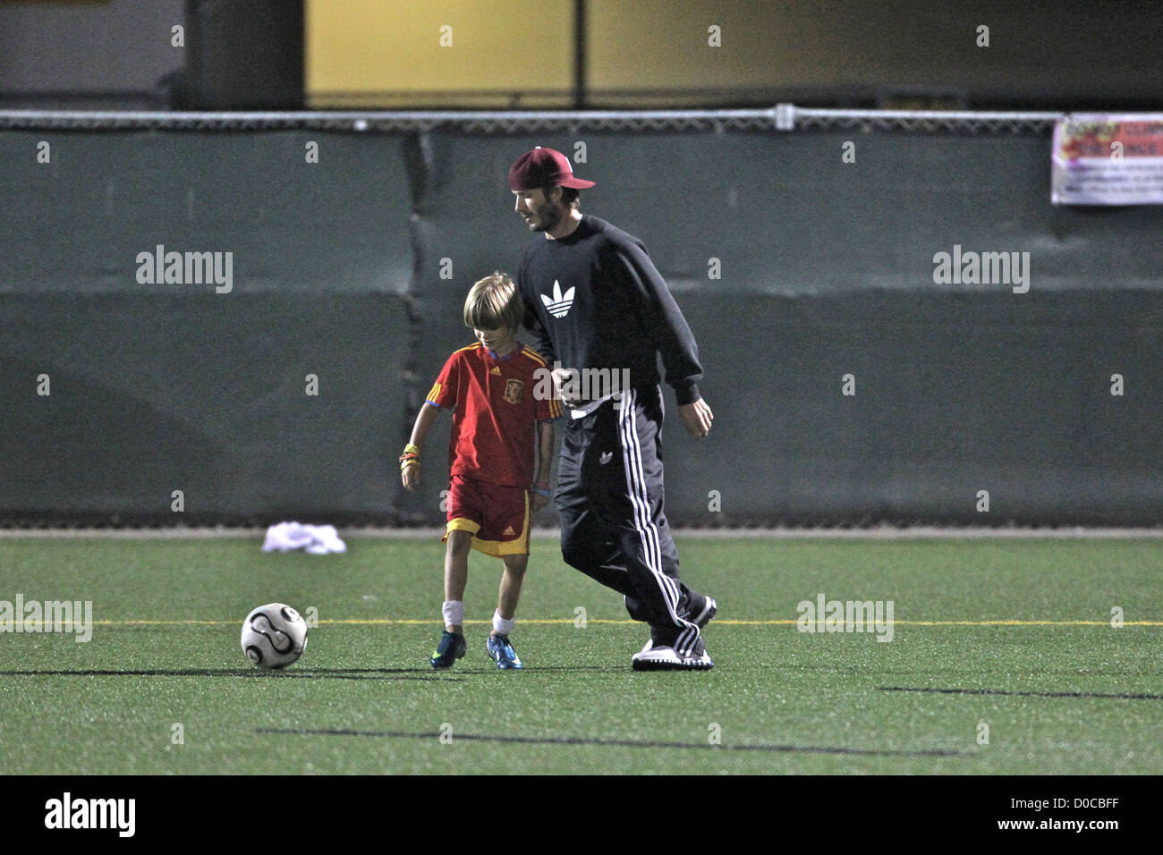 David Beckham with his son Romeo David Beckham plays ball with his two ...