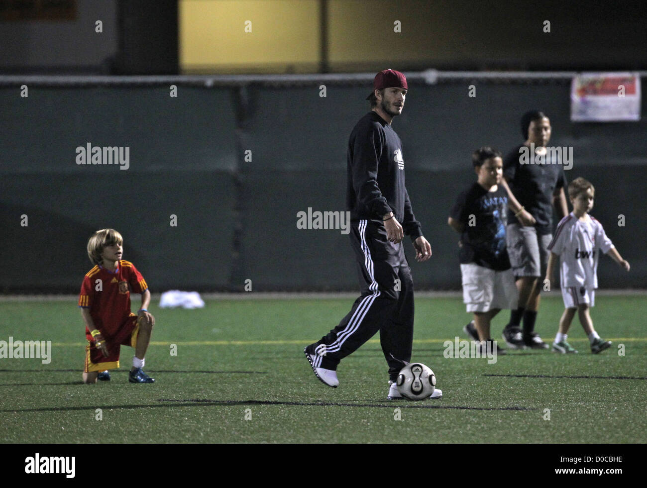 David Beckham with his son Romeo David Beckham plays ball with his two ...