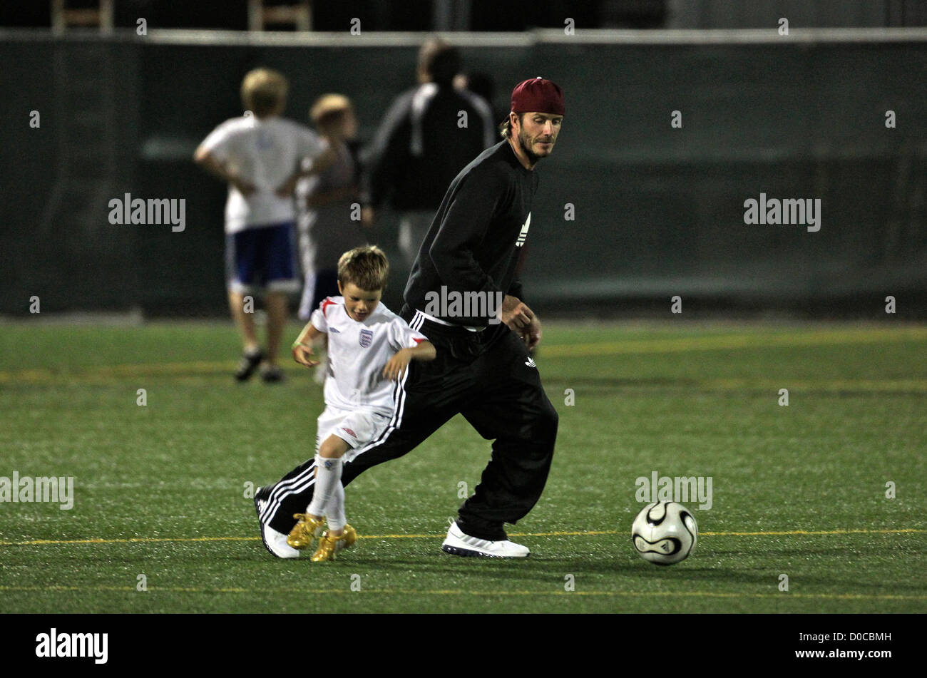 David Beckham with his son Cruz David Beckham plays ball with his two ...