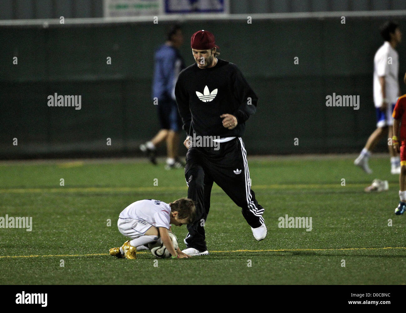 David Beckham with his son Cruz David Beckham plays ball with his two ...