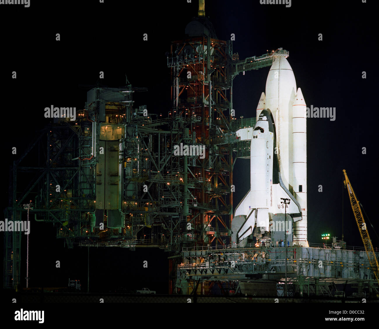 Space Shuttle Columbia (STS-1) and Rotating Service Structure at Night ...