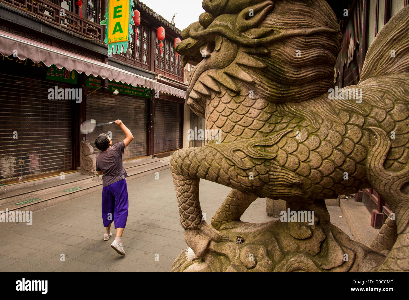 Chinese people play badminton in the Yu Gardens bazaar Shanghai, China ...