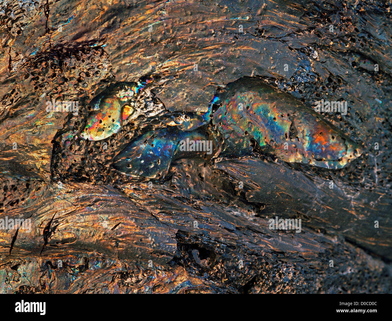 Iridescent Rainbow Bubbles in Lava Flow Stock Photo - Alamy