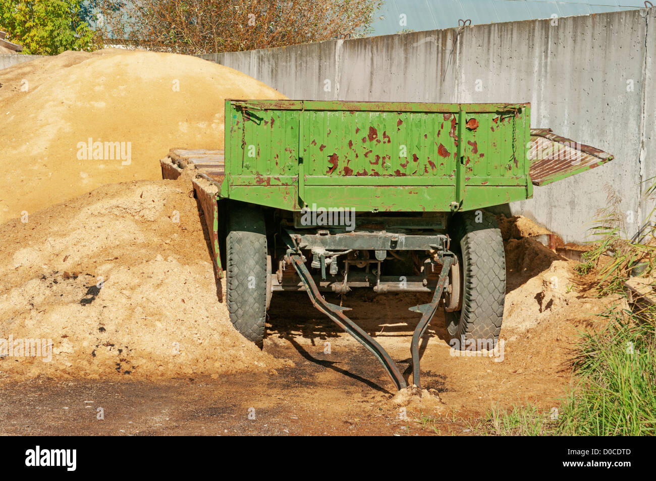 Sand unloading from the automobile trailer Stock Photo - Alamy