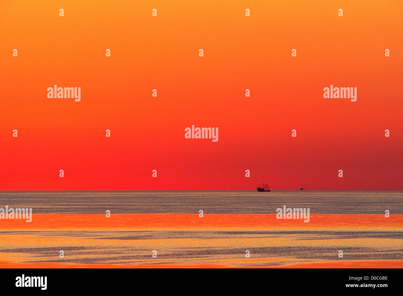 Pre-Dawn Light Casts a Brilliant Orange Glow onto the Northern Sea of ...