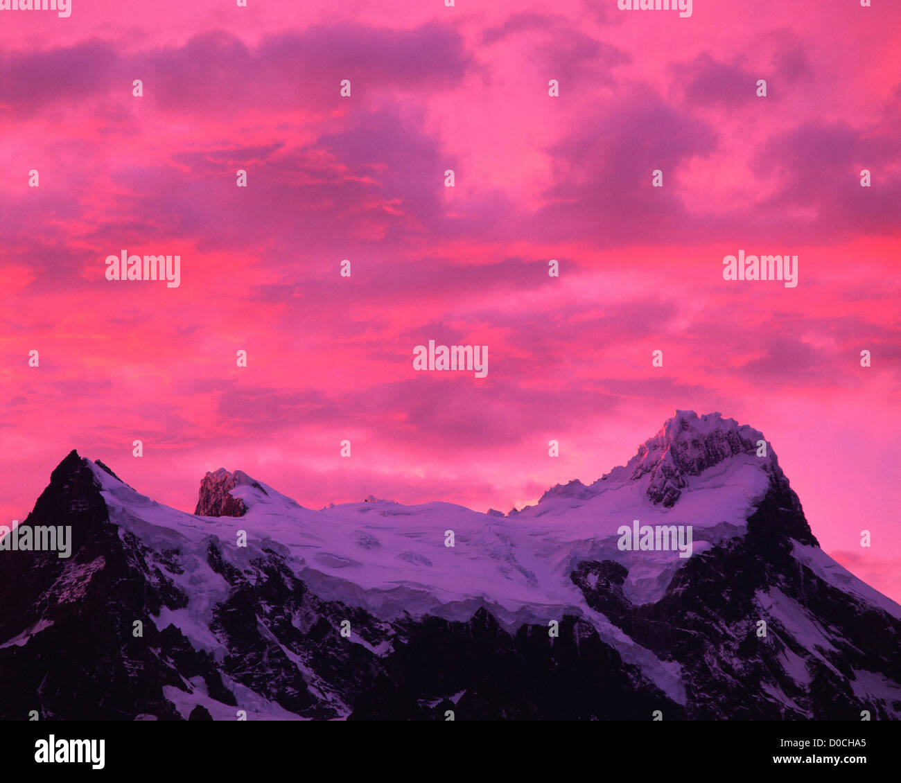 Roseate Sunset Light on Clouds Above the Summit of Cerro Paine Grande Stock Photo - Alamy