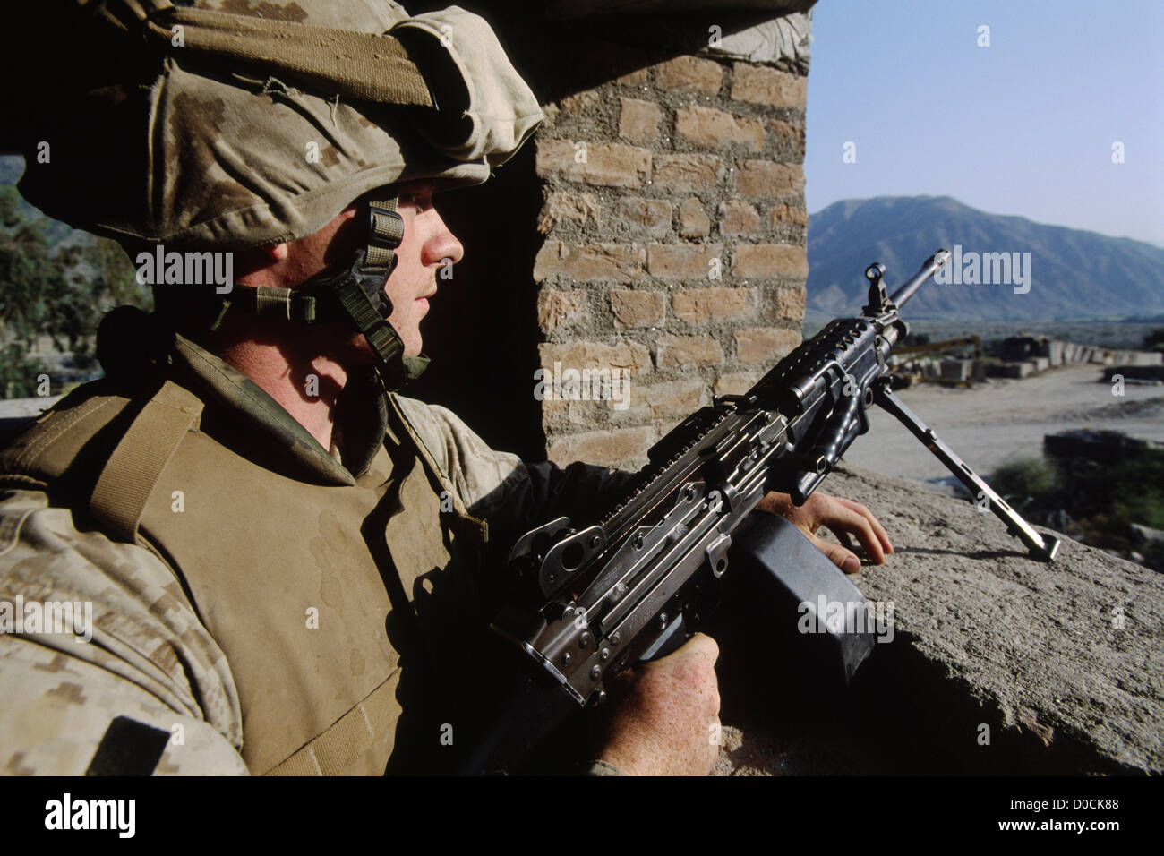 US Marine Infantryman Guards a Forward Operating Base in Asadabad ...