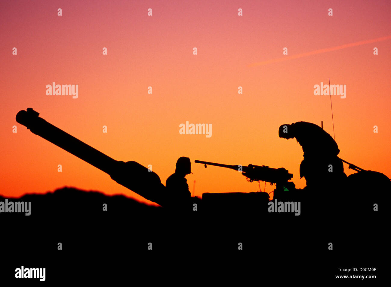 Silhouettes of US Marine Tank Drivers on an M1A1 Abrams Battle Tank ...