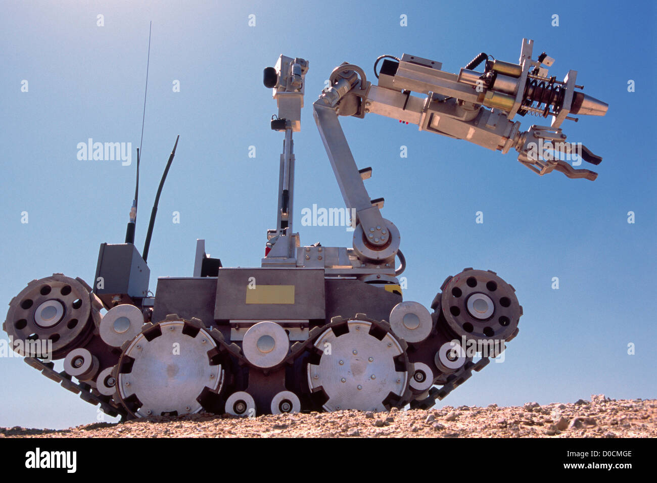 An Explosive Ordnance Disposal Robot Outstretches its Boom Stock Photo ...