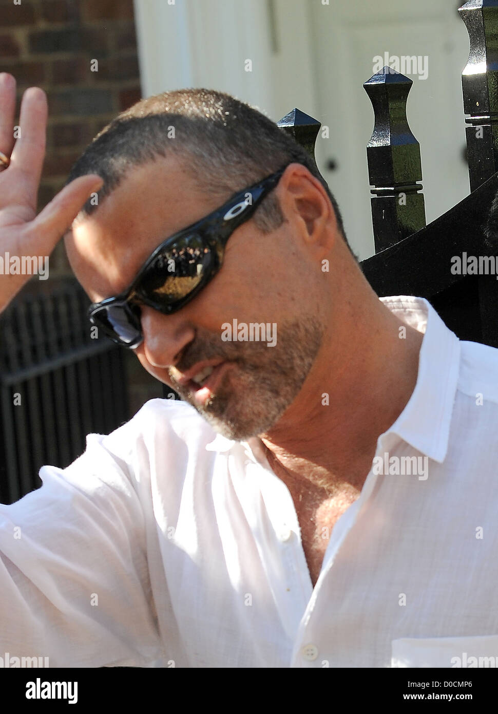 George Michael arrives back home after being released from prison ...